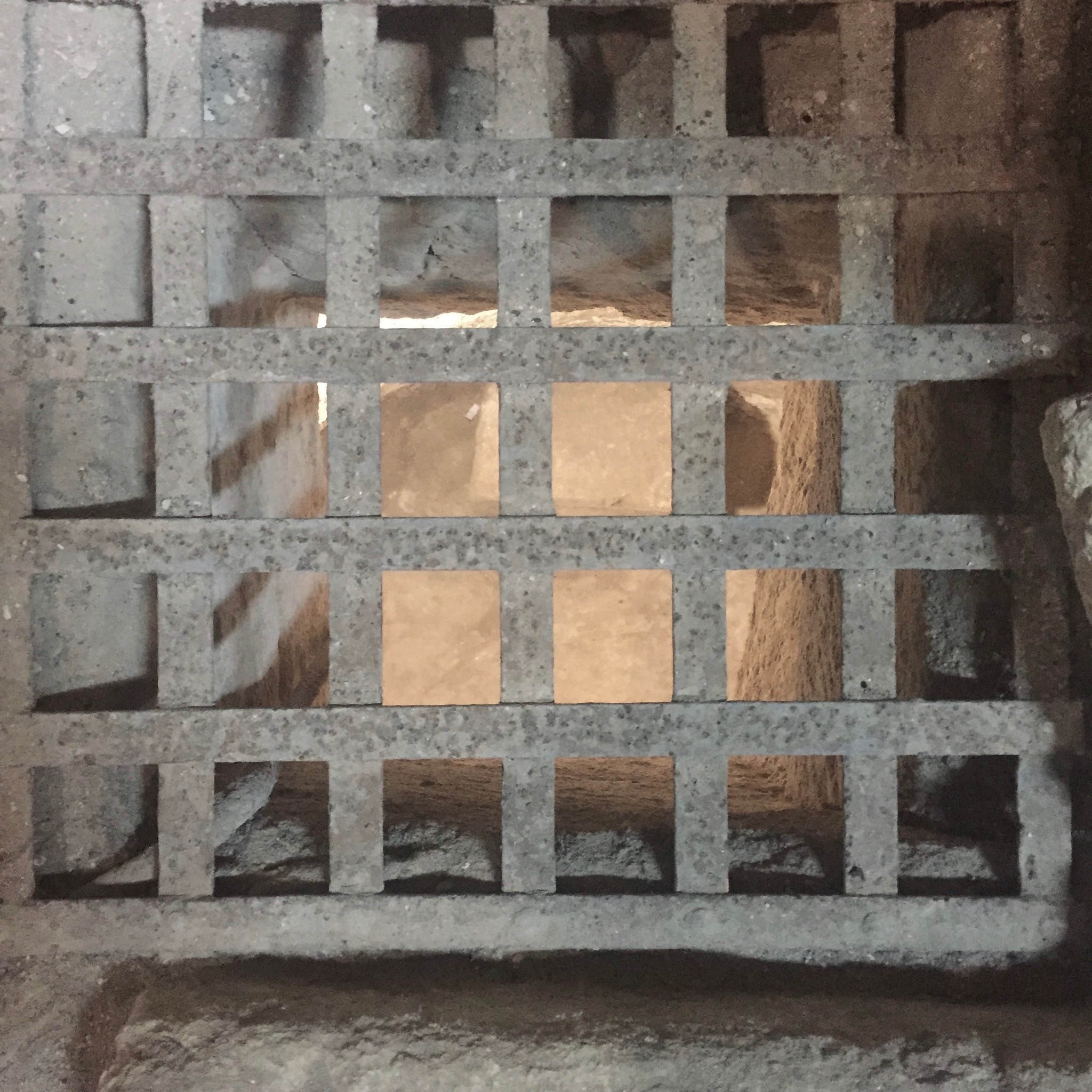 Metal grille, probably Crusader, placed to allow pilgrims to view the ...
