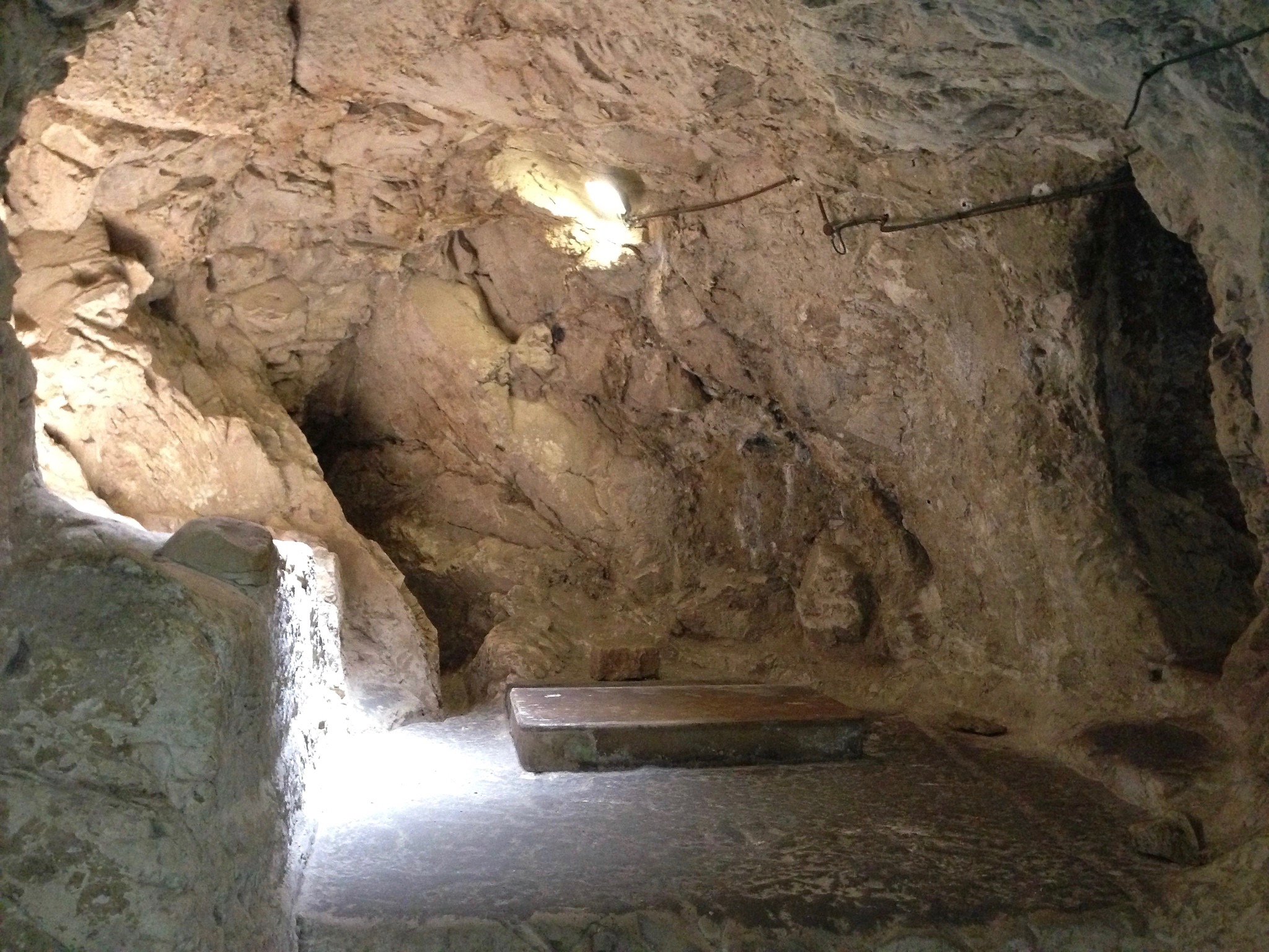 View of the cave church with a raised stone indicating the place of the ...